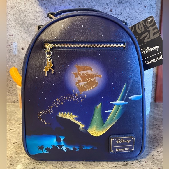 Loungefly | Bags | Loungefly Disney Peter Pan Flying Jolly Roger ...